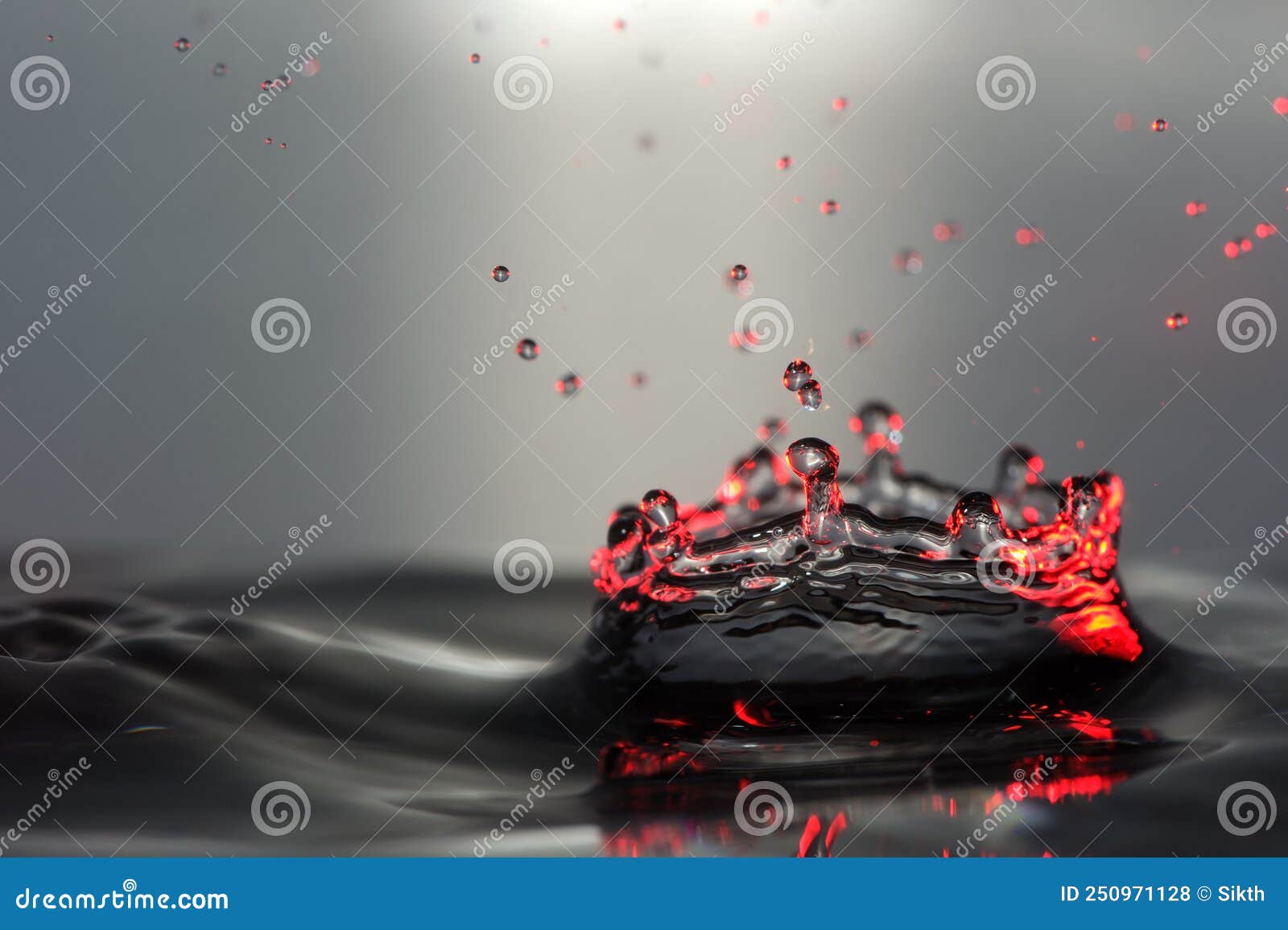 Water Splash with Red Highlights Stock Photo - Image of gray, pure ...
