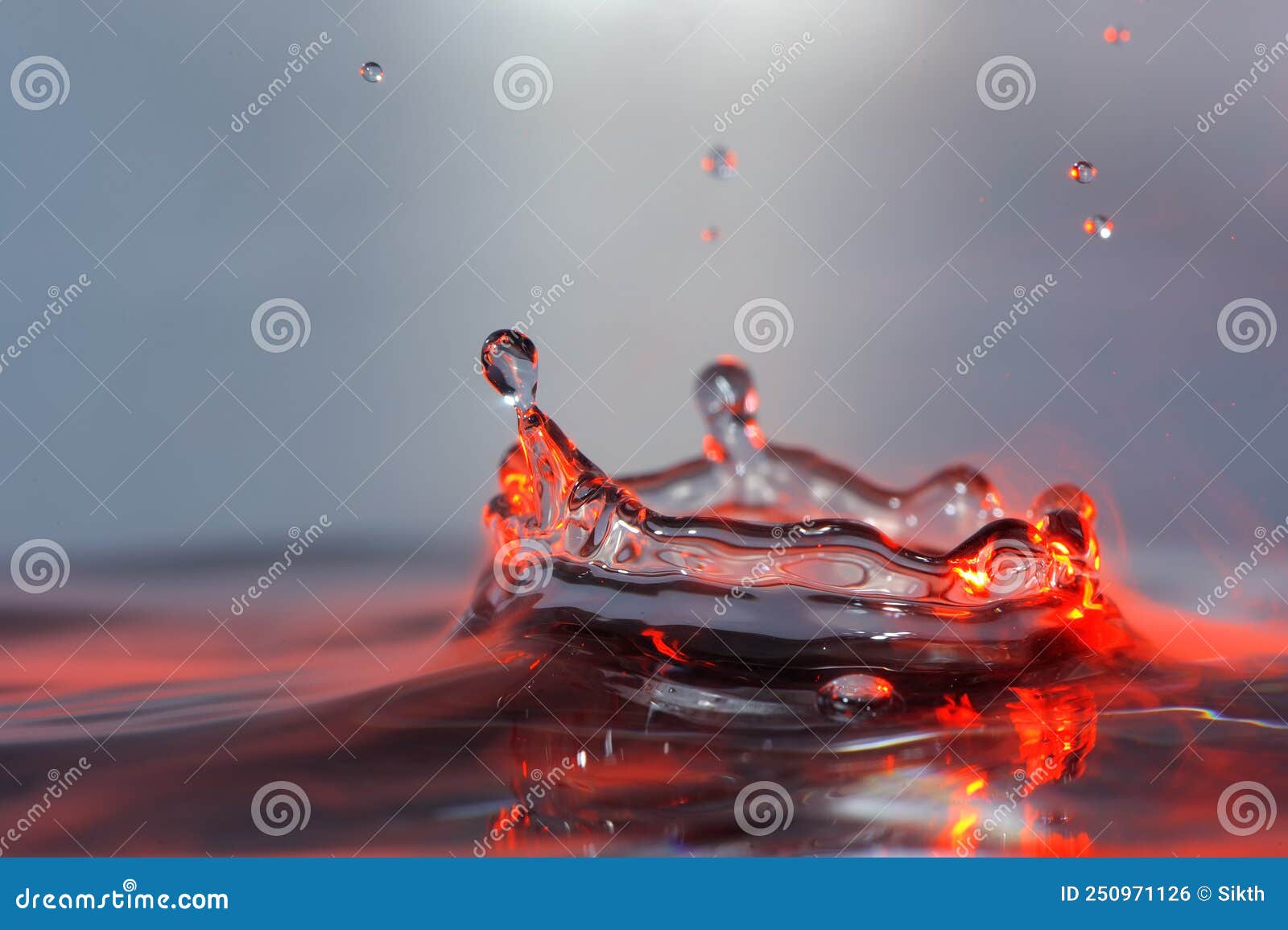 Water Splash with Red Reflection Macro Stock Photo - Image of splash ...