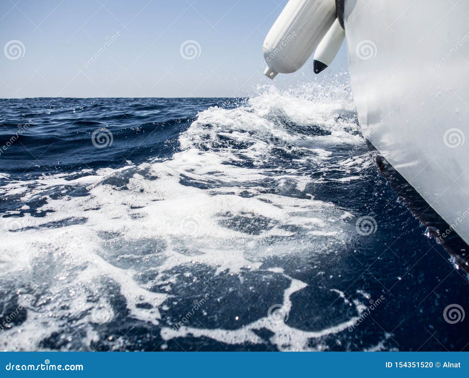 Water Splashes at the Board of a Boat Stock Photo - Image of splash ...
