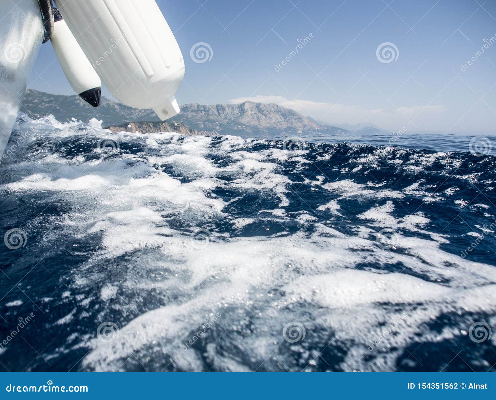Water Splashes at the Board of a Boat Stock Photo - Image of motion ...
