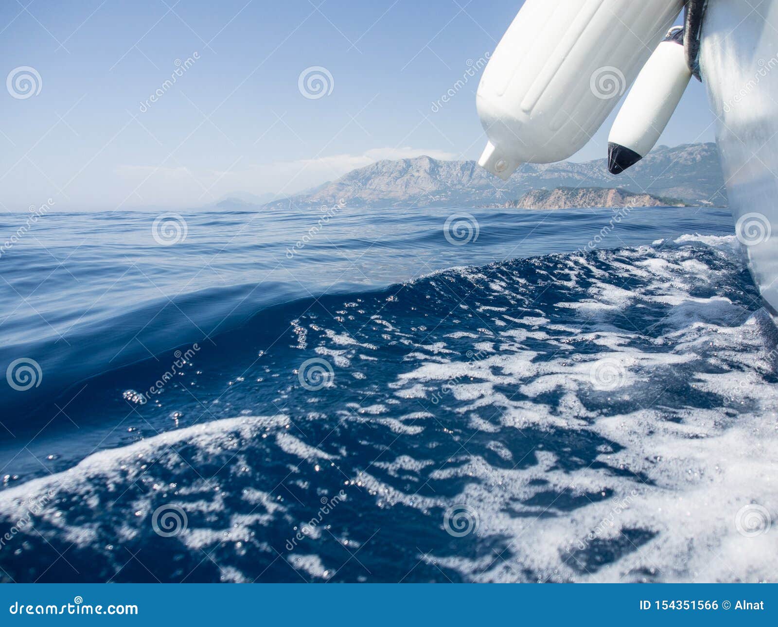 Water Splashes at the Board of a Boat Stock Photo - Image of fender ...