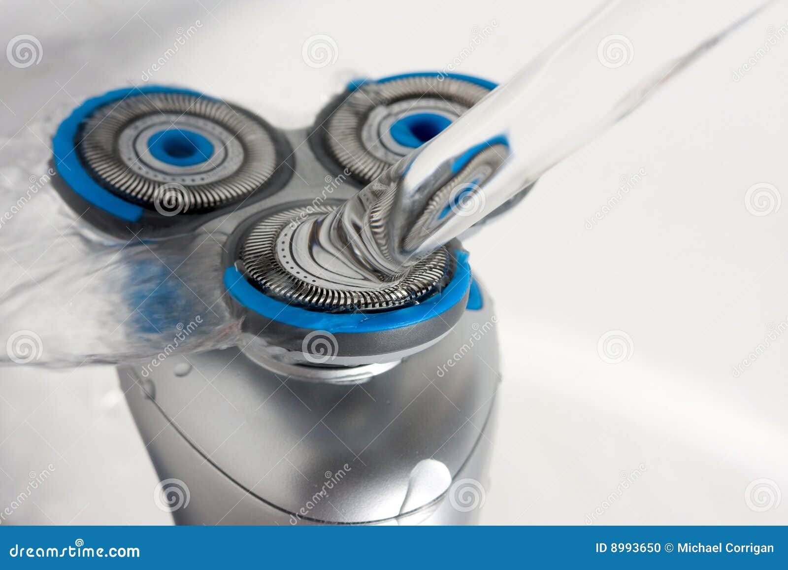 Water Splashes Off Rotary Shaver Head Picture. Image: 8993650