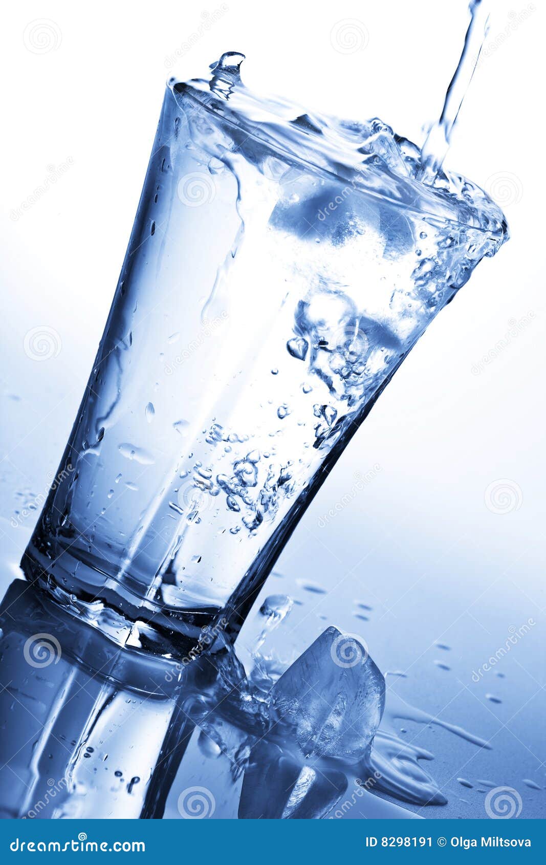 Water splashing into glass stock image. Image of cube - 8298191