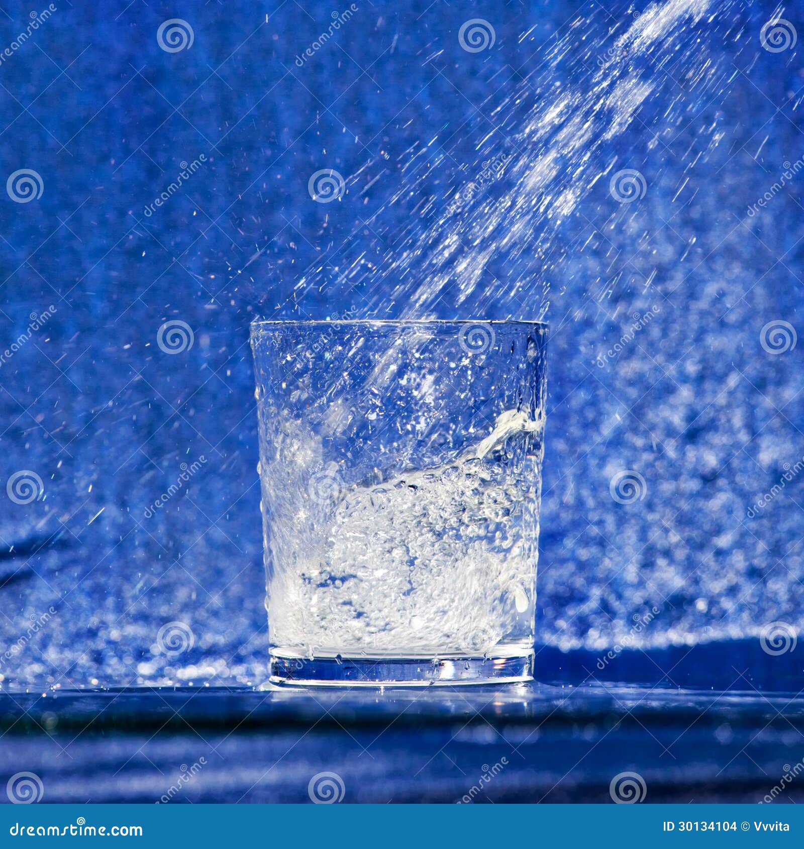 Splashing water from glass stock photo. Image of glass - 30134104