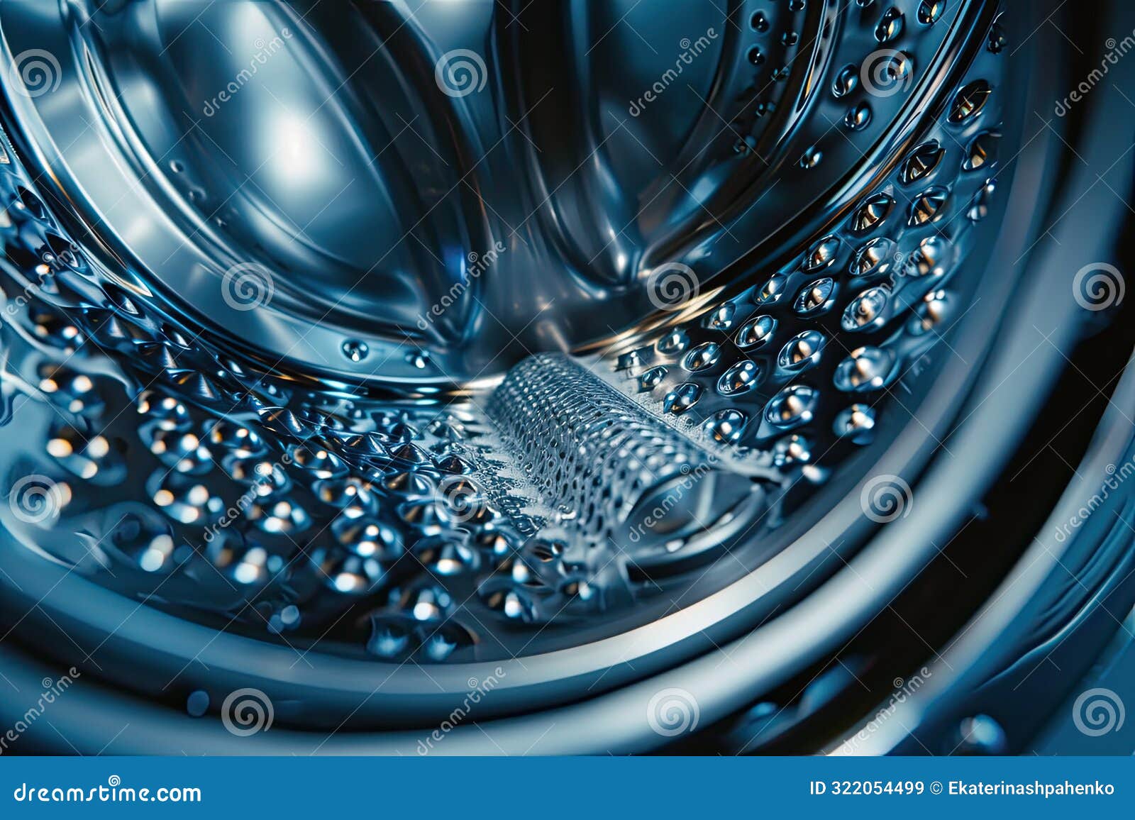 Water Splashing Out of the Washing Machine Drum, in a Closeup View ...