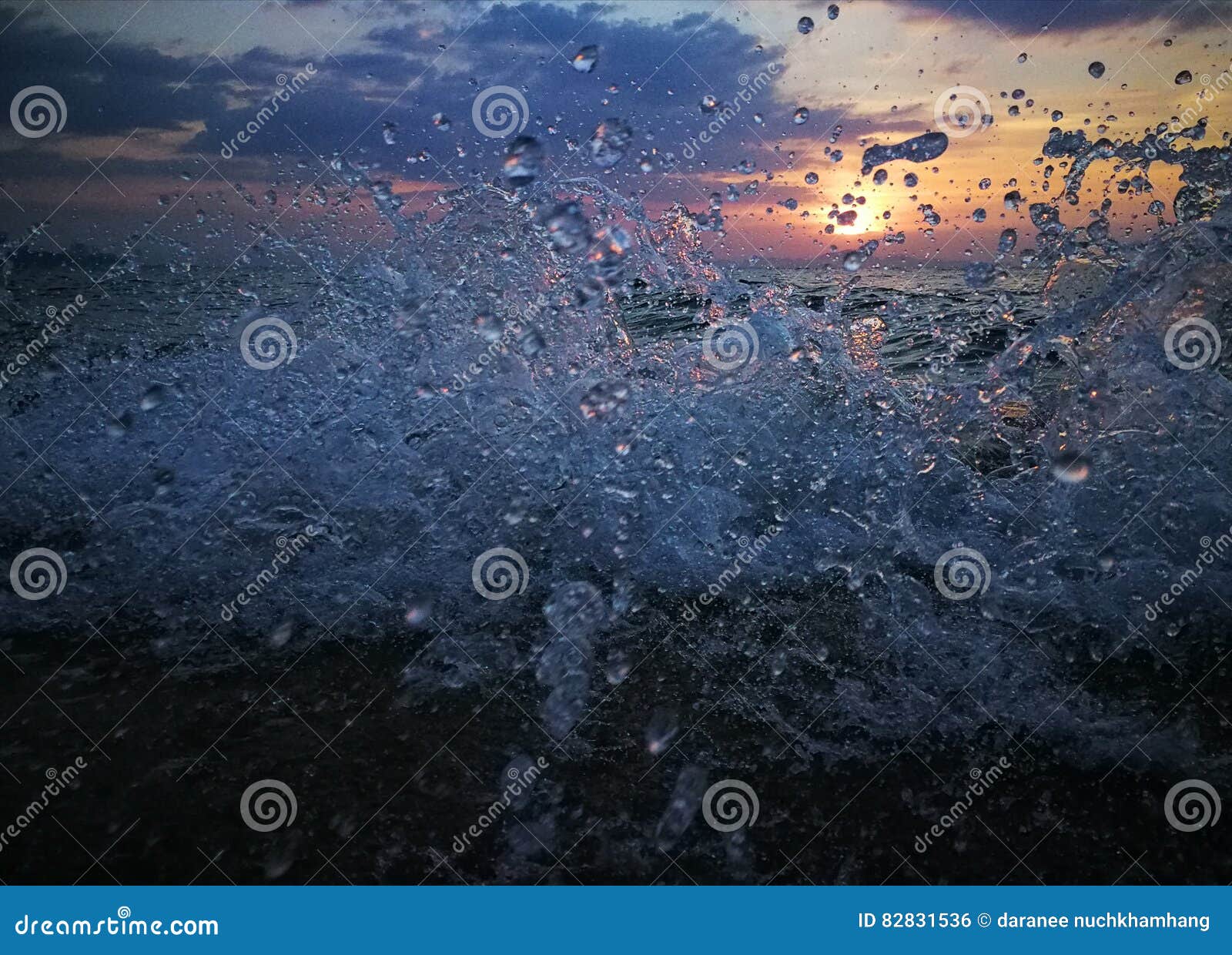 Water splatter stock photo. Image of water, sunset, beach - 82831536