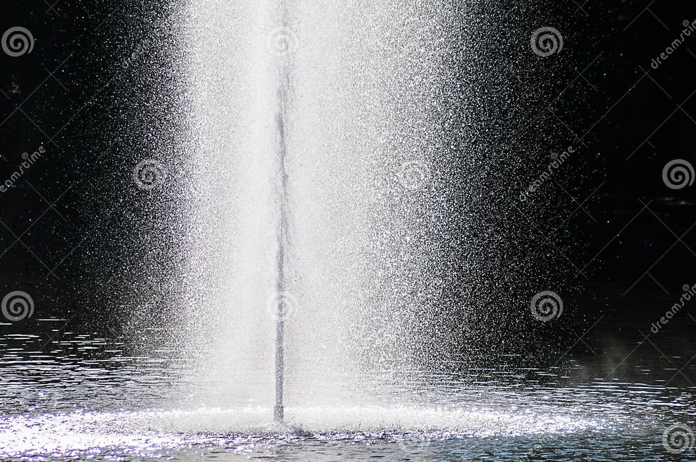 Water spout stock image. Image of illuminated, spout - 35392041