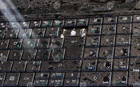 Water Spray Pouring Onto Bilingual European Computer Keyboard Laptop ...