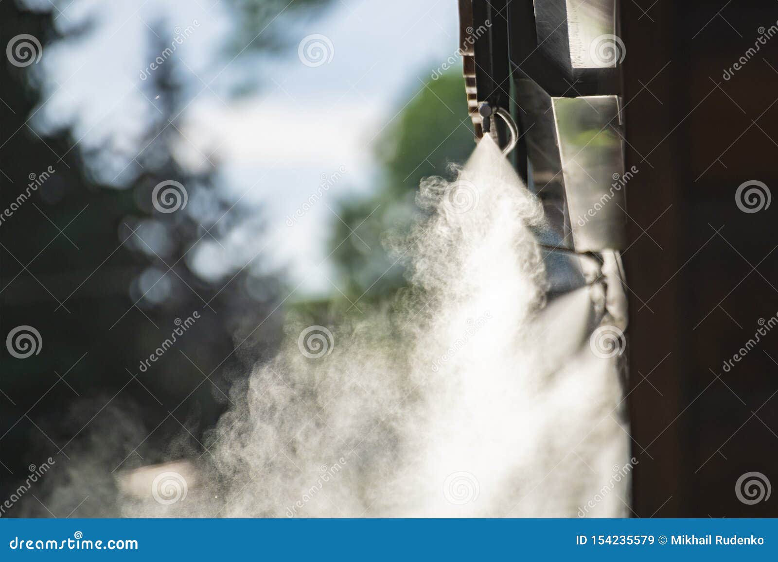 Water Spray System for Cooling in a Public Cafe at the Boiling Hot ...