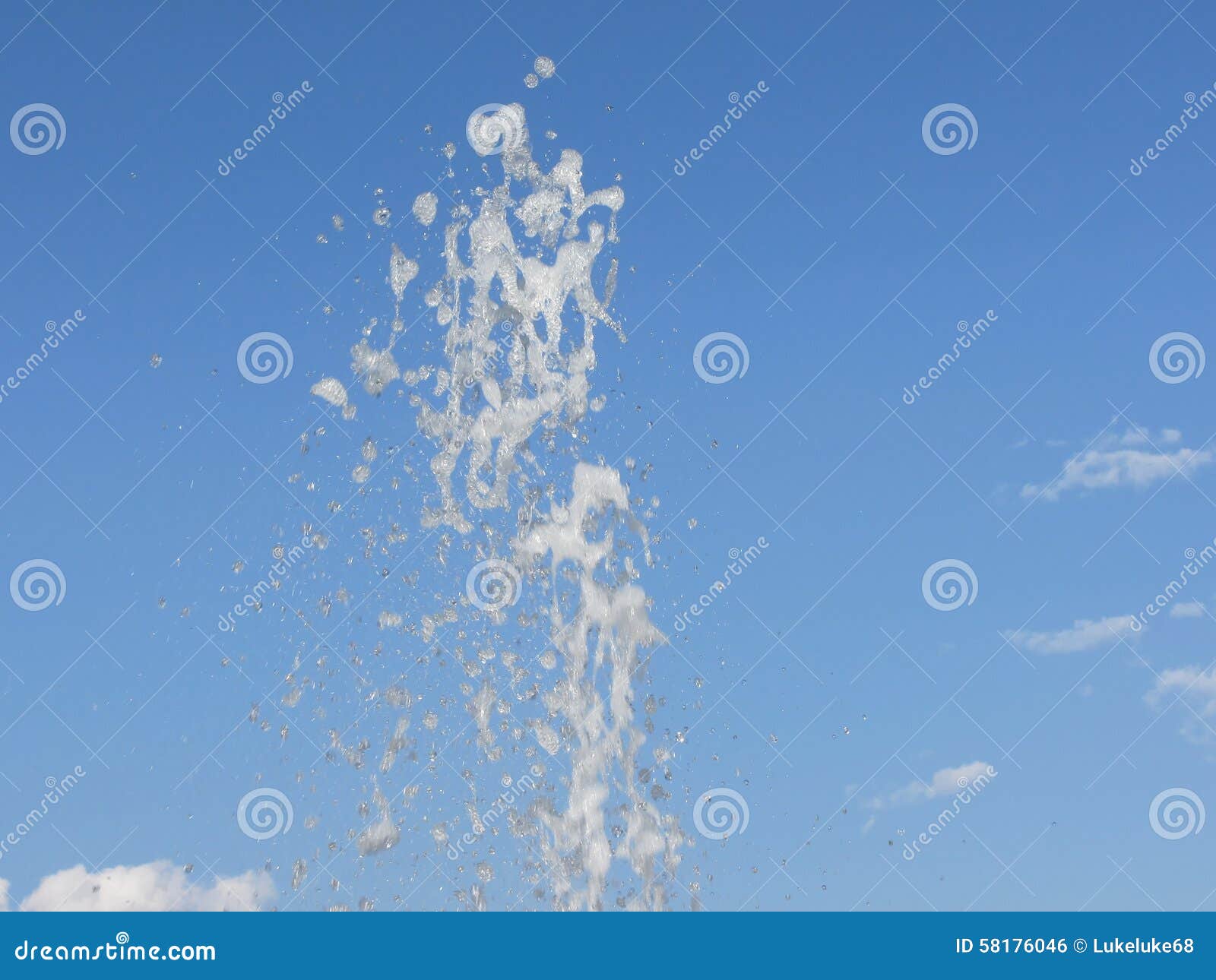 Water Spraying from a Fountain Against the Blue Sky Stock Photo - Image ...