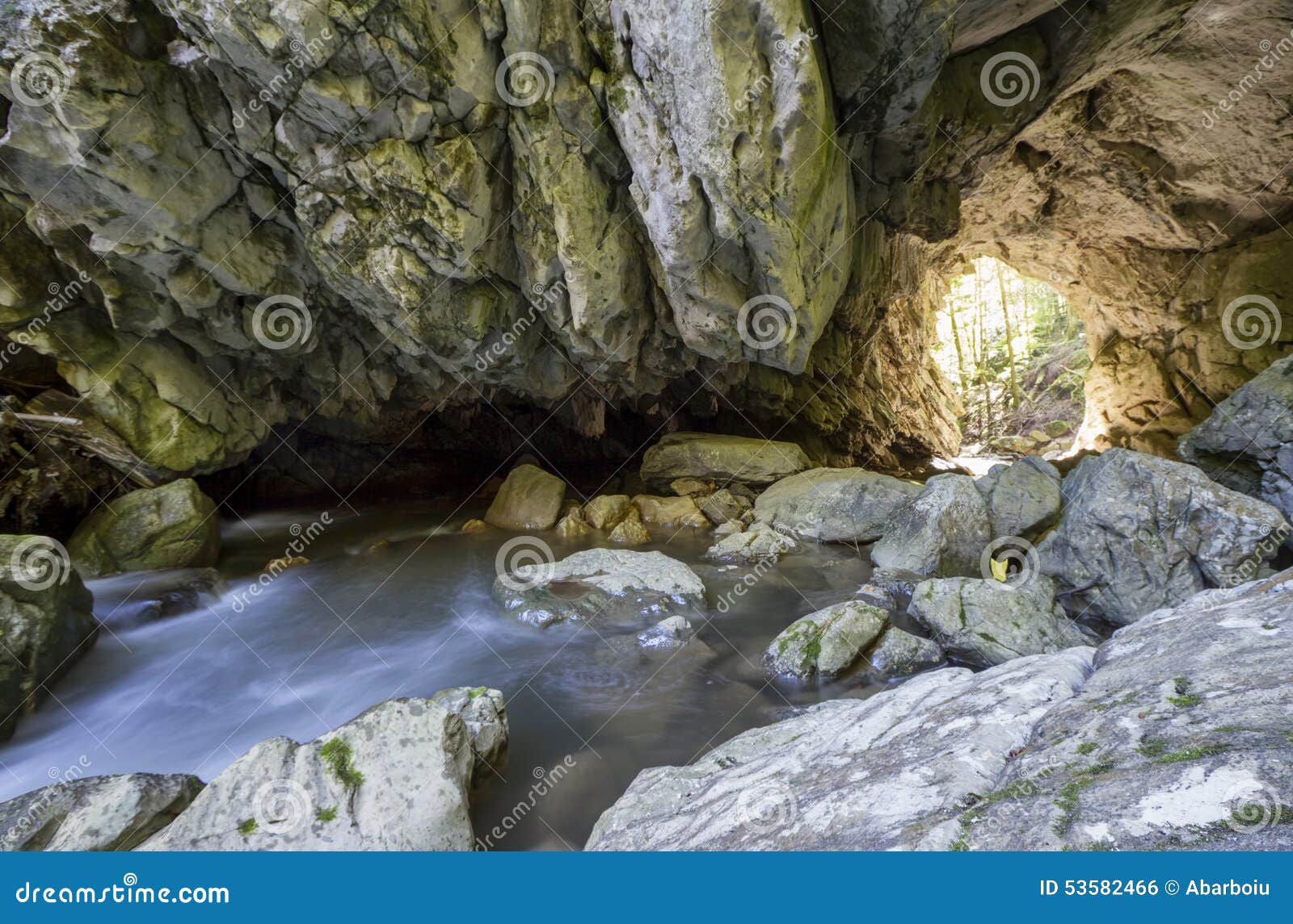 Water through stone tunnel stock photo. Image of mineral - 53582466