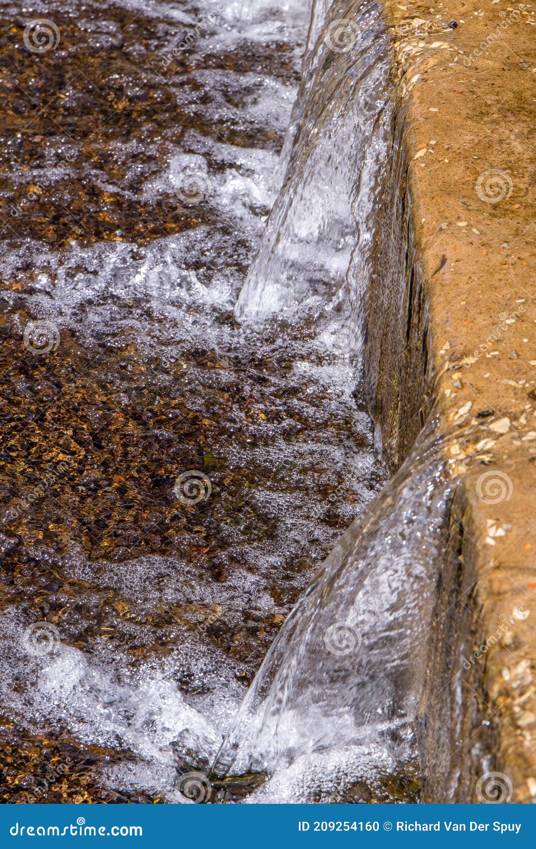 Water Flows Over a Low Wall Stock Photo - Image of graphic, runs: 209254160