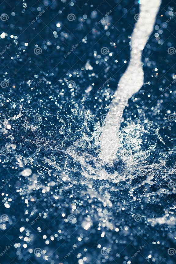 Water Stream with Splash Drops, Blue Background Stock Photo - Image of ...