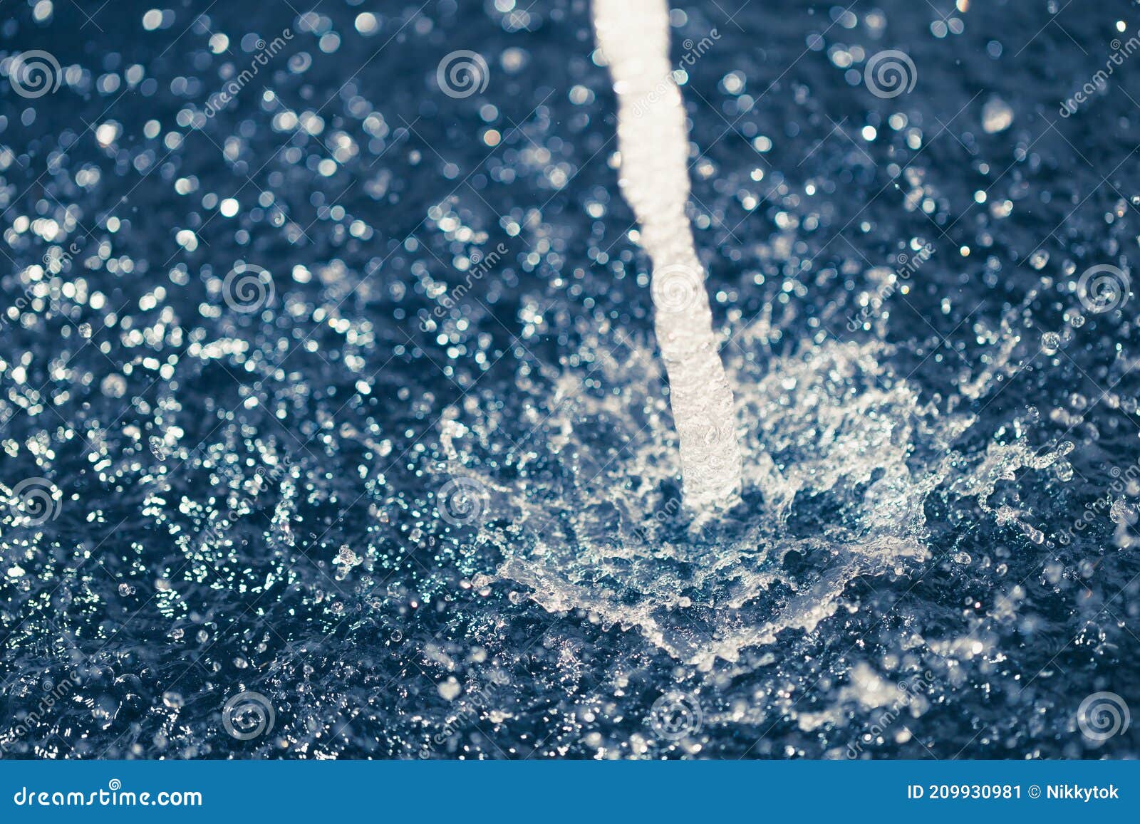 Water Stream with Splash Drops, Blue Background Stock Image - Image of ...