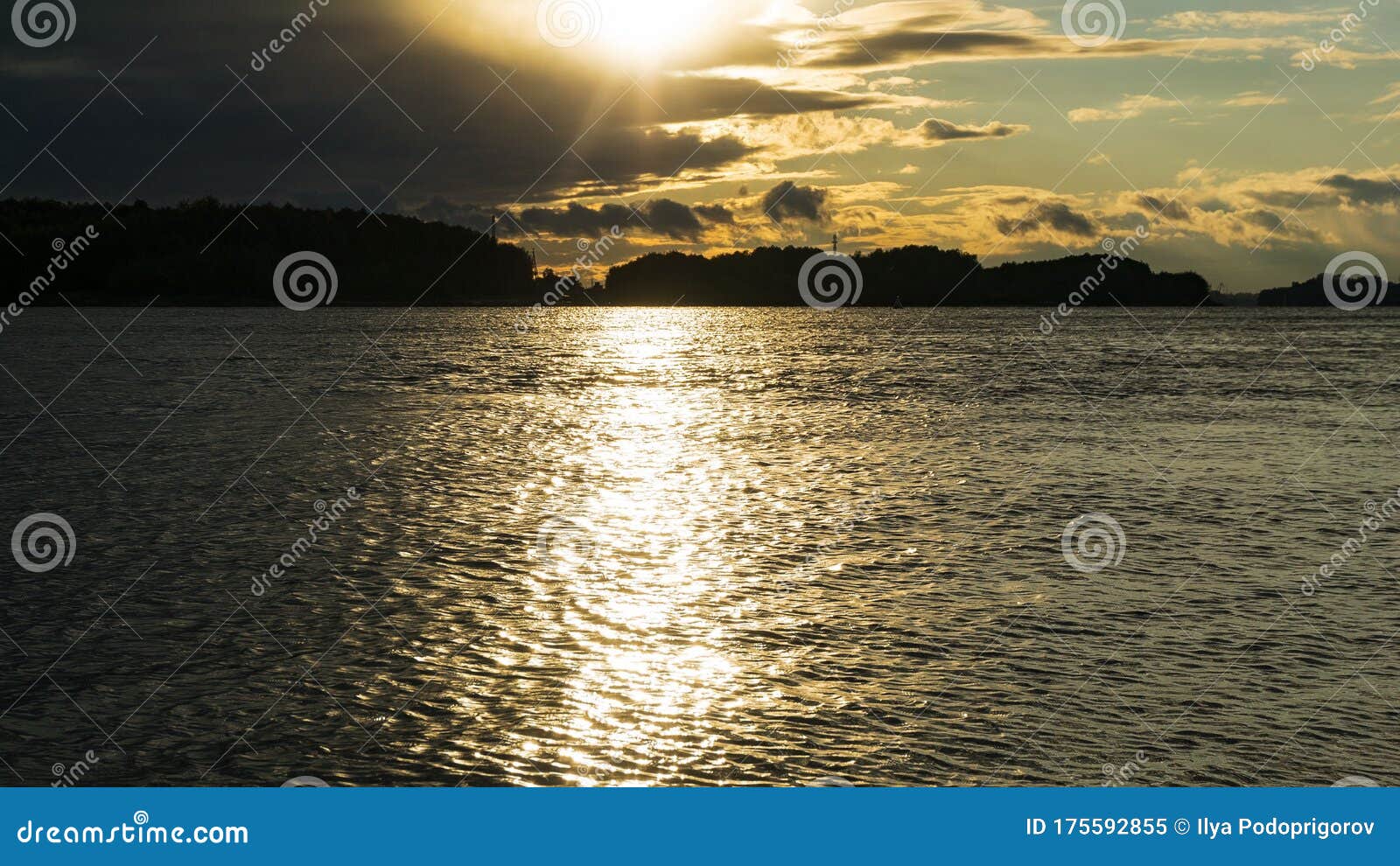 Water Surface in the Light of the Setting Sun. Sunset Reflection in ...