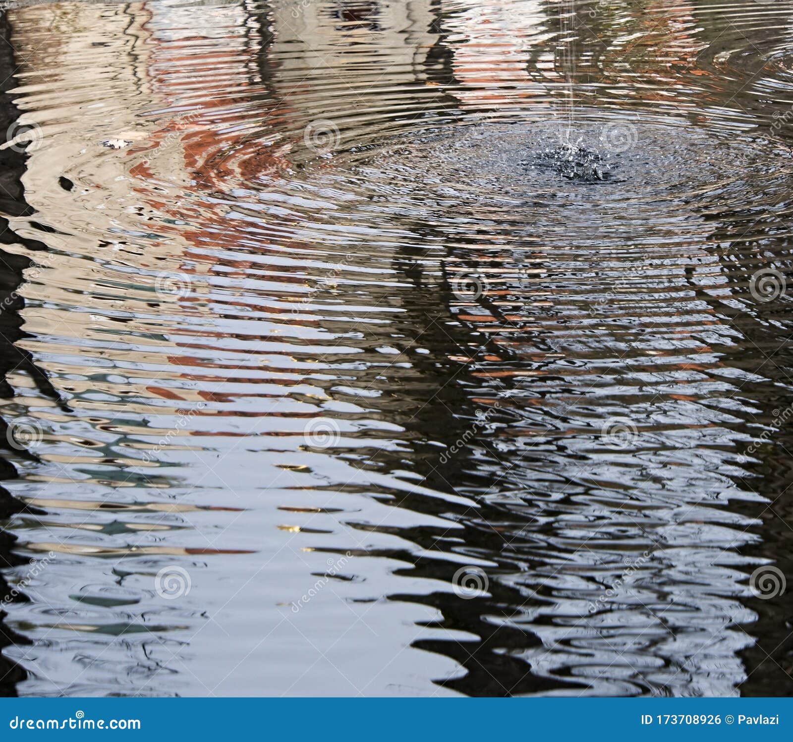 Water Surface Rippled by a Stream Falling from a Fountain Stock Photo ...