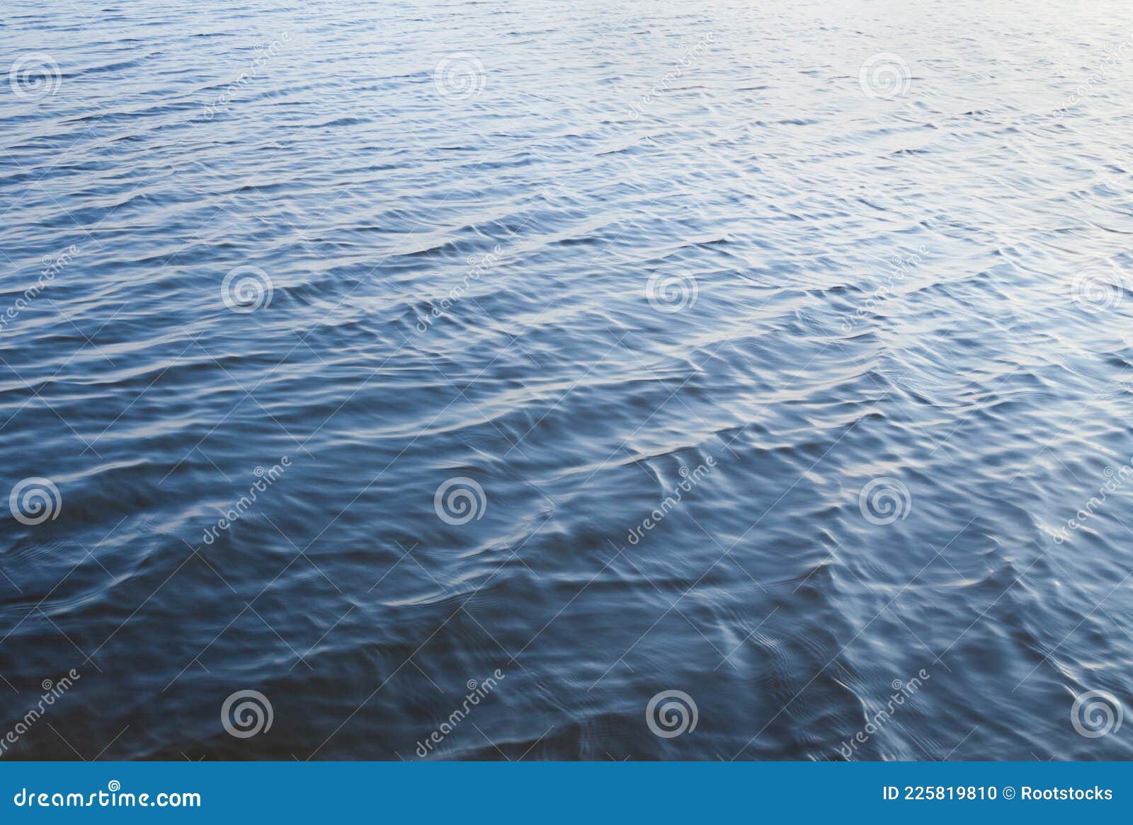Water surface with ripples stock photo. Image of basin - 225819810