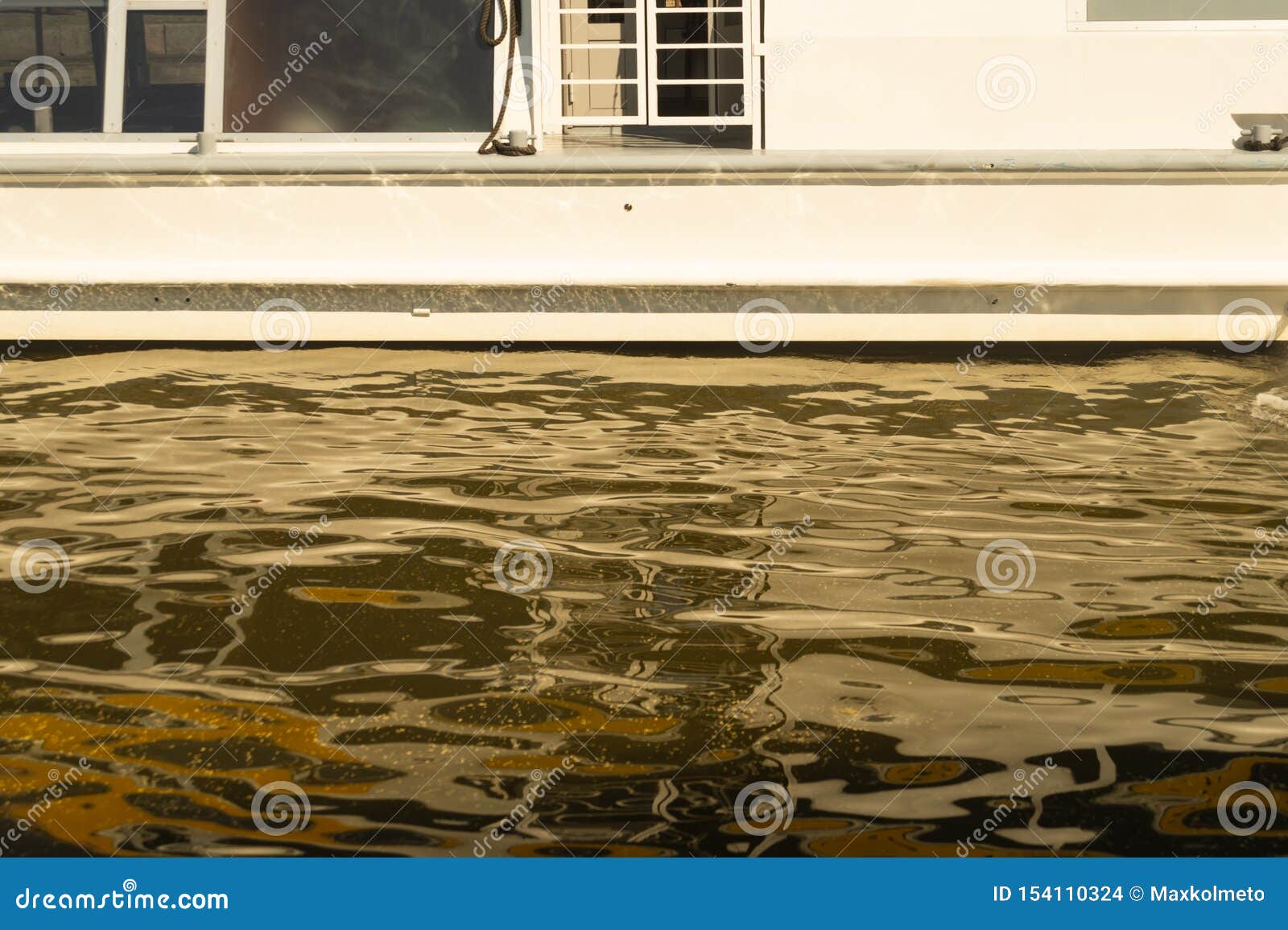 Water Surface With Ripples And Part Of A Ship. Water Texture Background ...