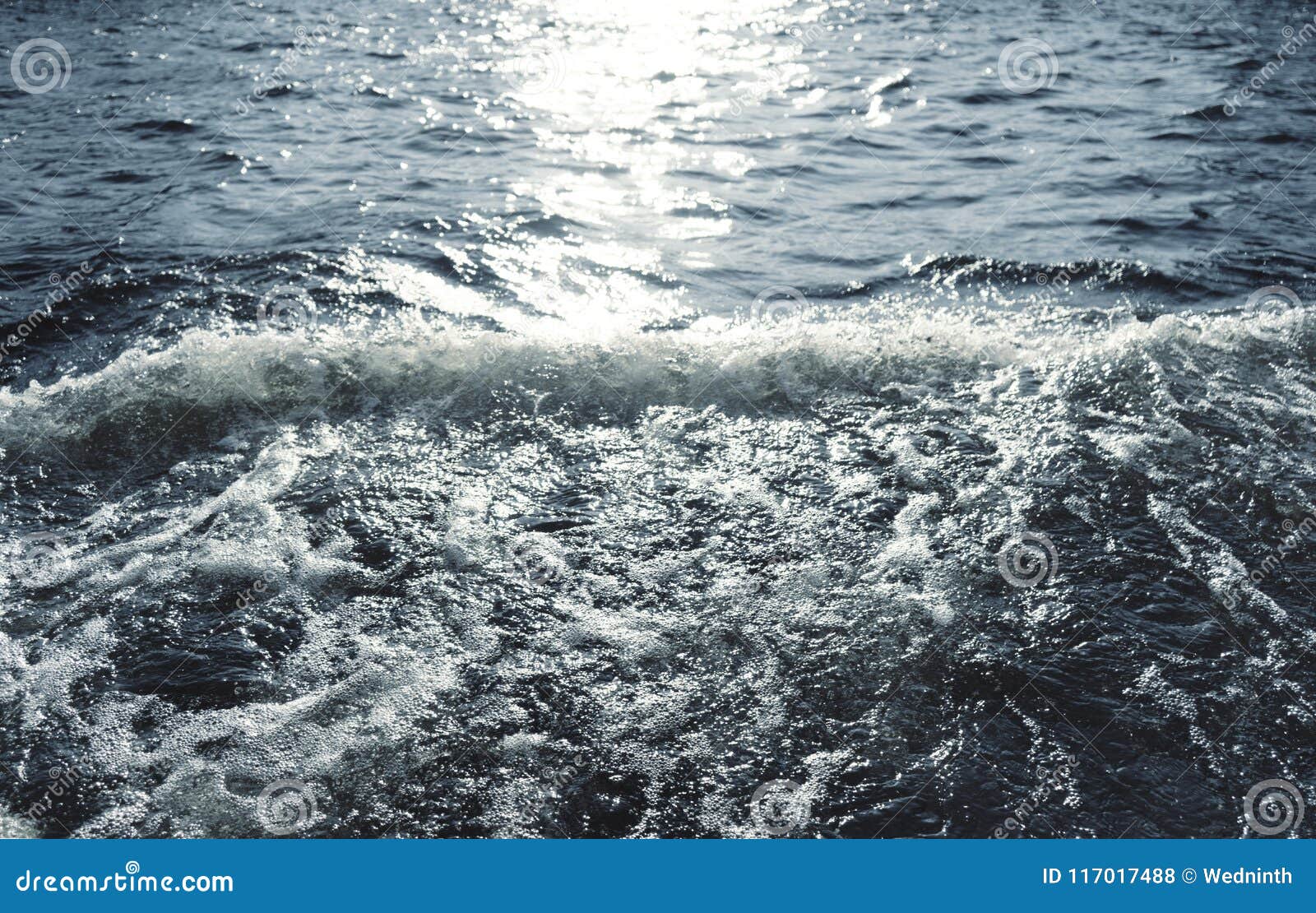 Water Surface with Ripples and Sunlight Reflections Stock Photo - Image ...