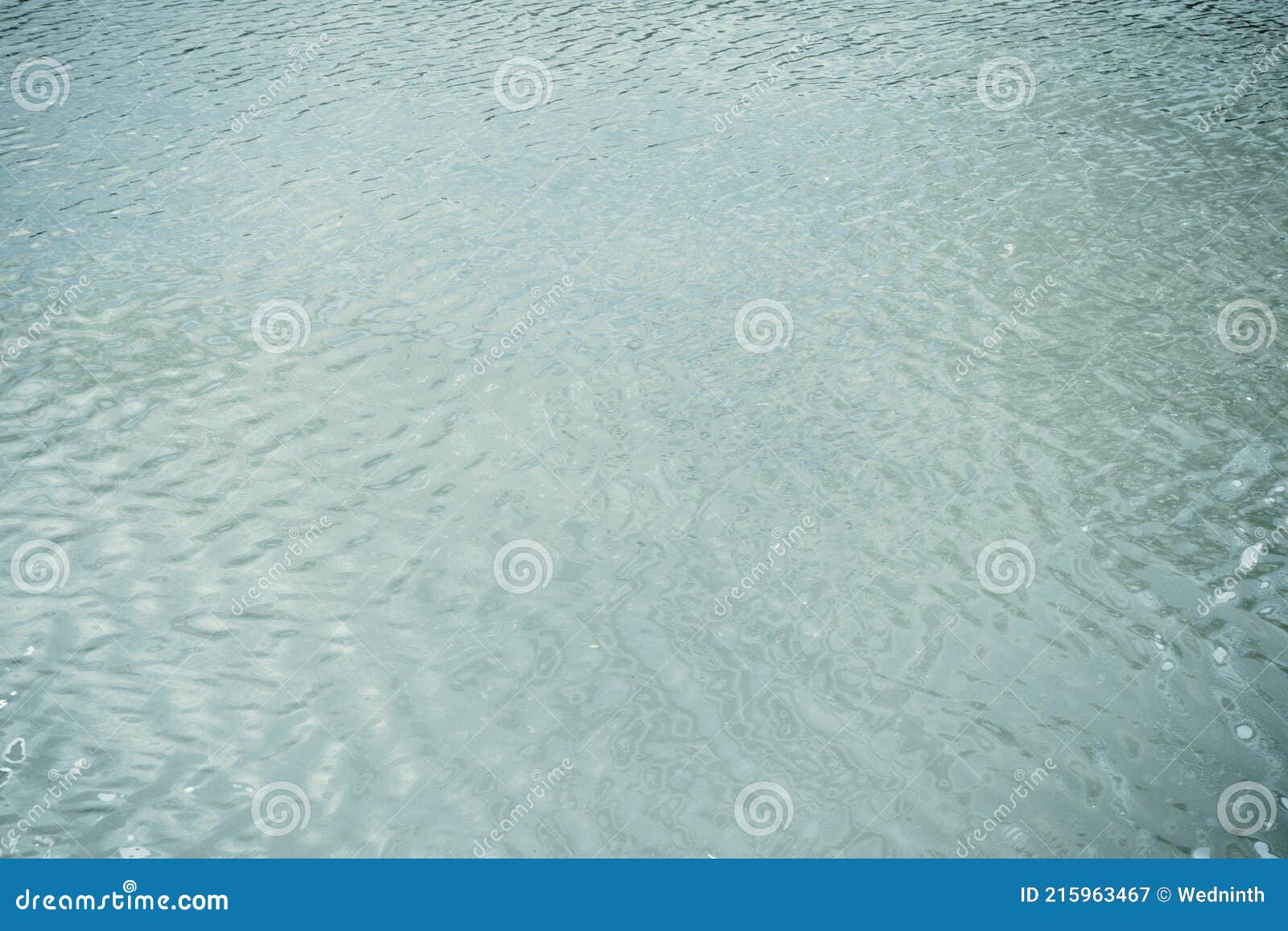 Water Surface with Ripples and Sunlight Reflections Stock Image - Image ...