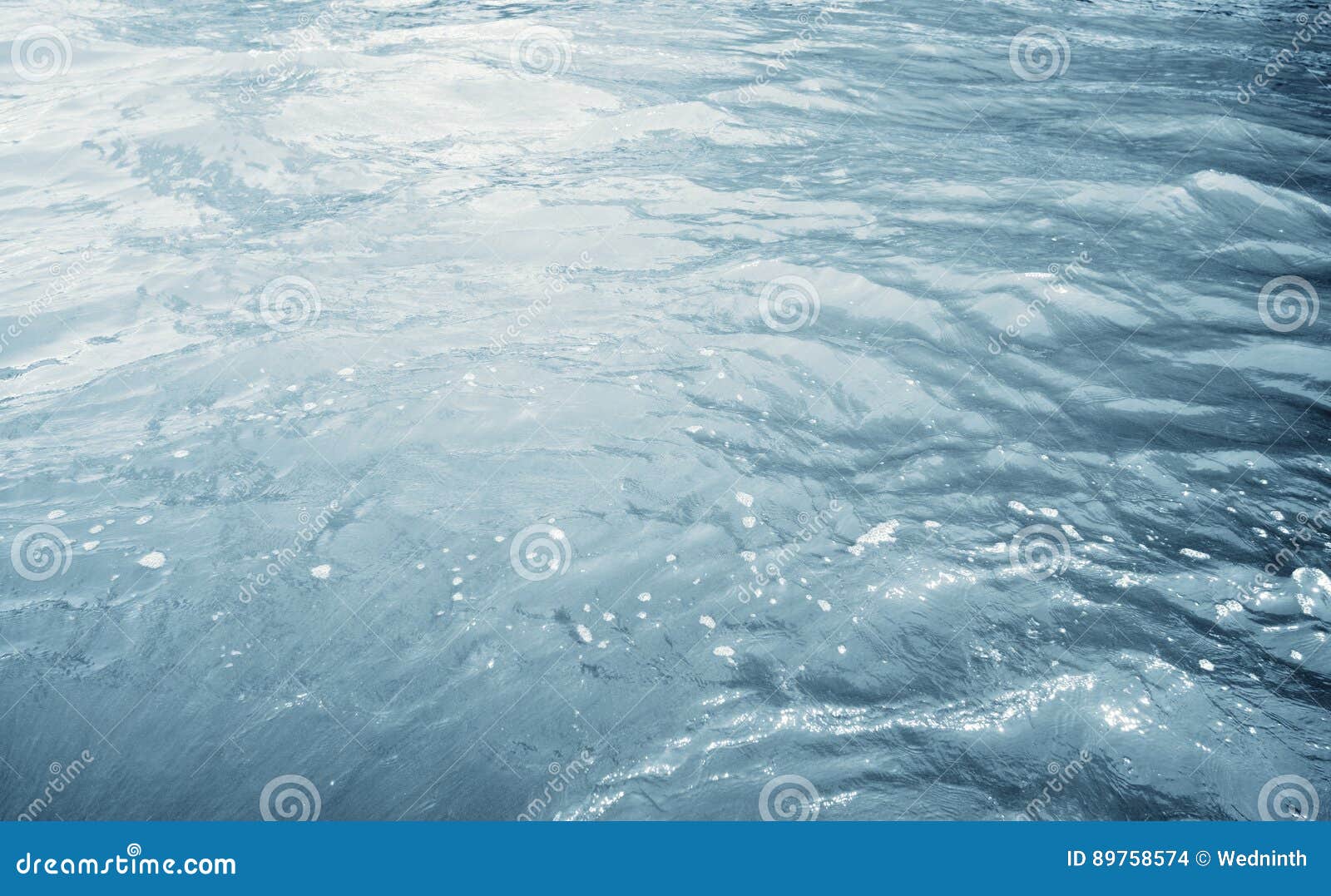 Water Surface with Ripples and Sunlight Reflections Stock Photo - Image ...
