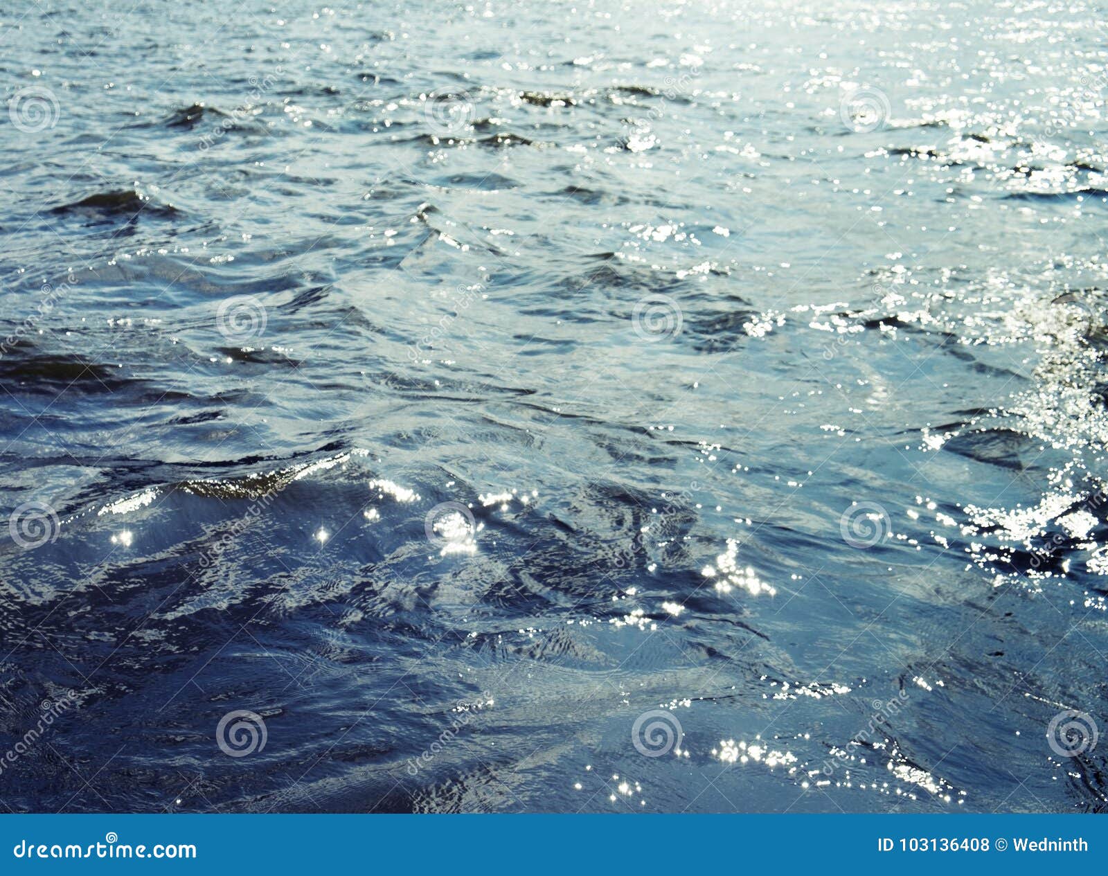 Water Surface with Ripples and Sunlight Reflections Stock Photo - Image ...