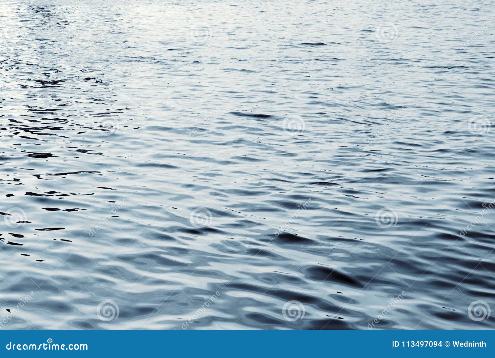 Water Surface with Ripples and Sunlight Reflections Stock Photo - Image ...