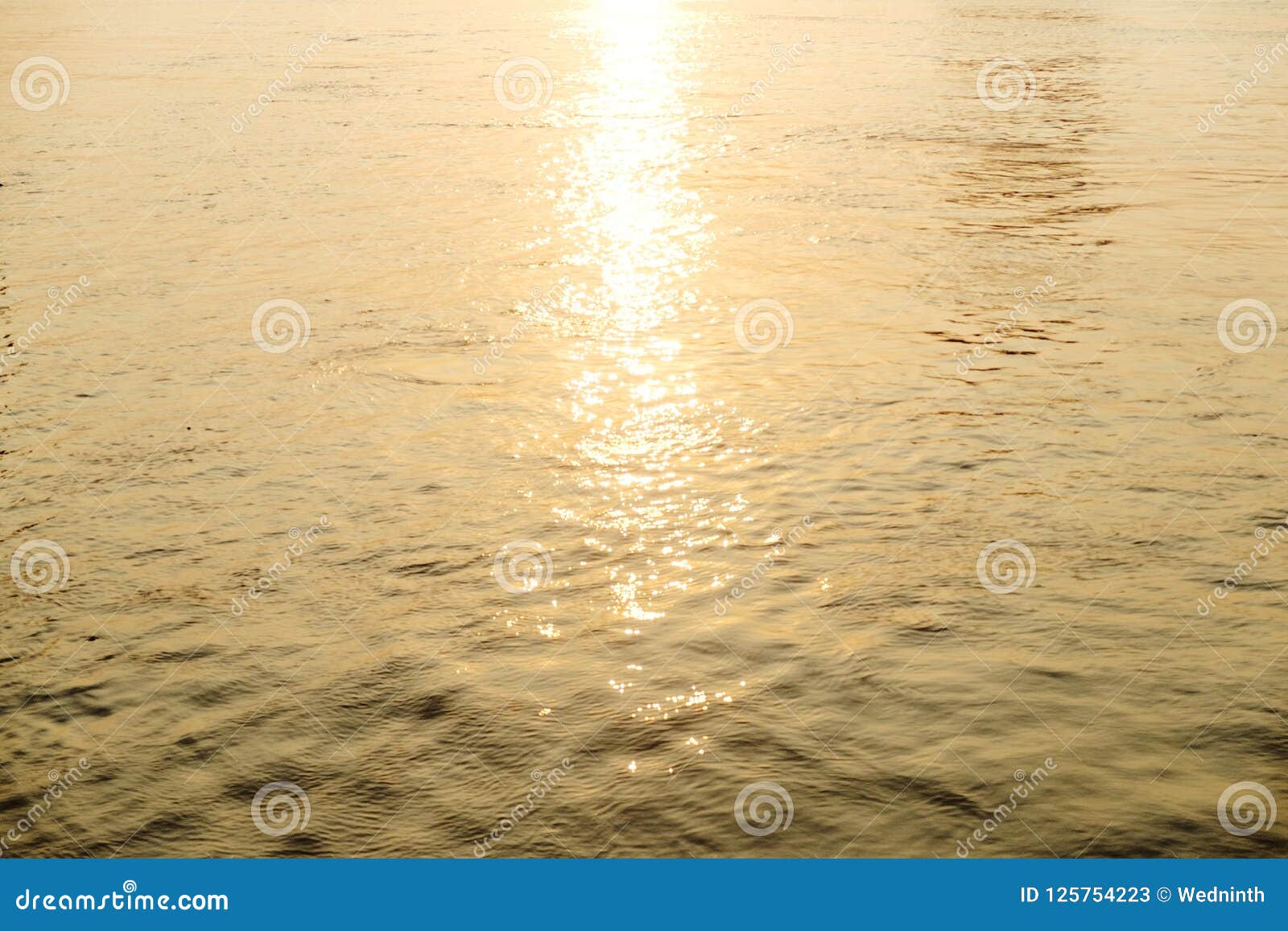 Water Surface with Ripples and Sunlight Reflections Stock Image - Image ...