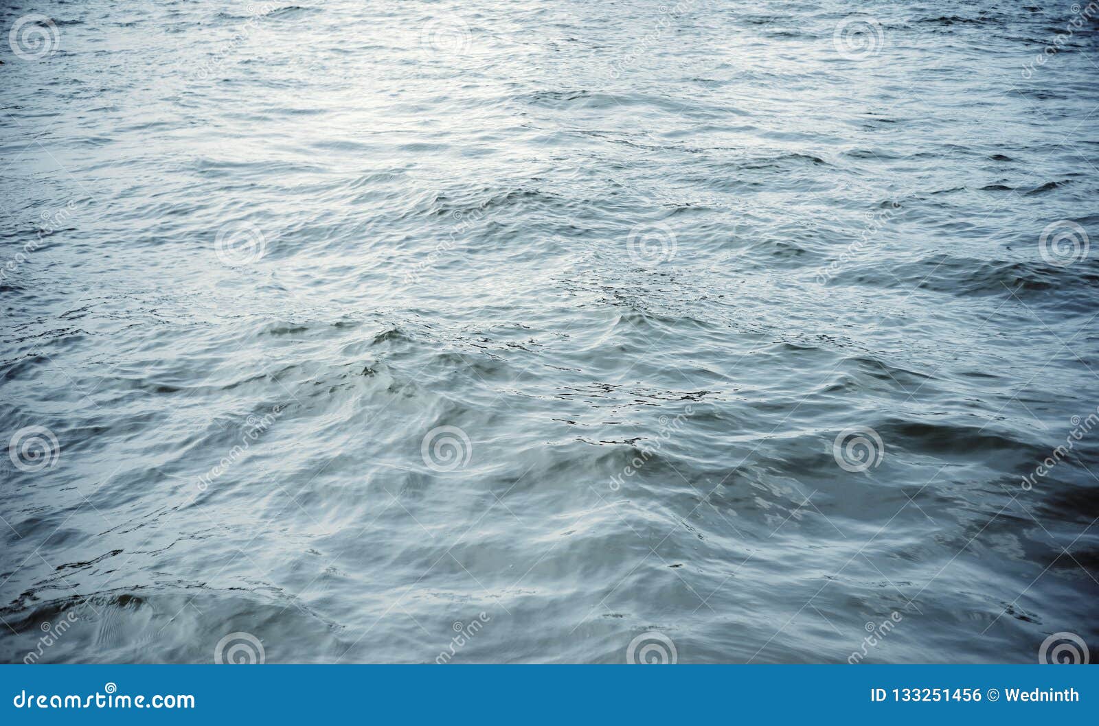 Water Surface with Ripples and Sunlight Reflections Stock Photo - Image ...