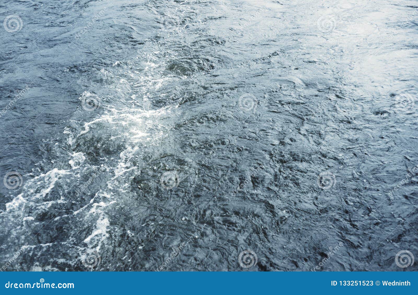 Water Surface with Ripples and Sunlight Reflections Stock Image - Image ...