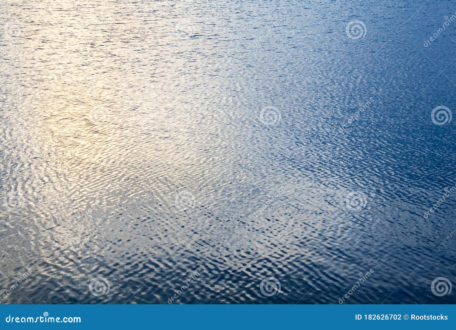 Water surface with ripples stock photo. Image of ripples - 182626702