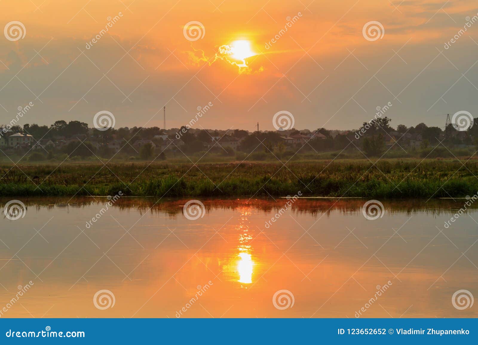 Water Surface of River at Sunset with Reflection of Orange Sun. River ...