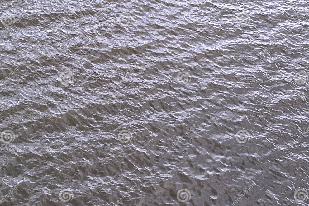 Water Surface Texture with Light Ripples Close-up. Stock Photo - Image ...