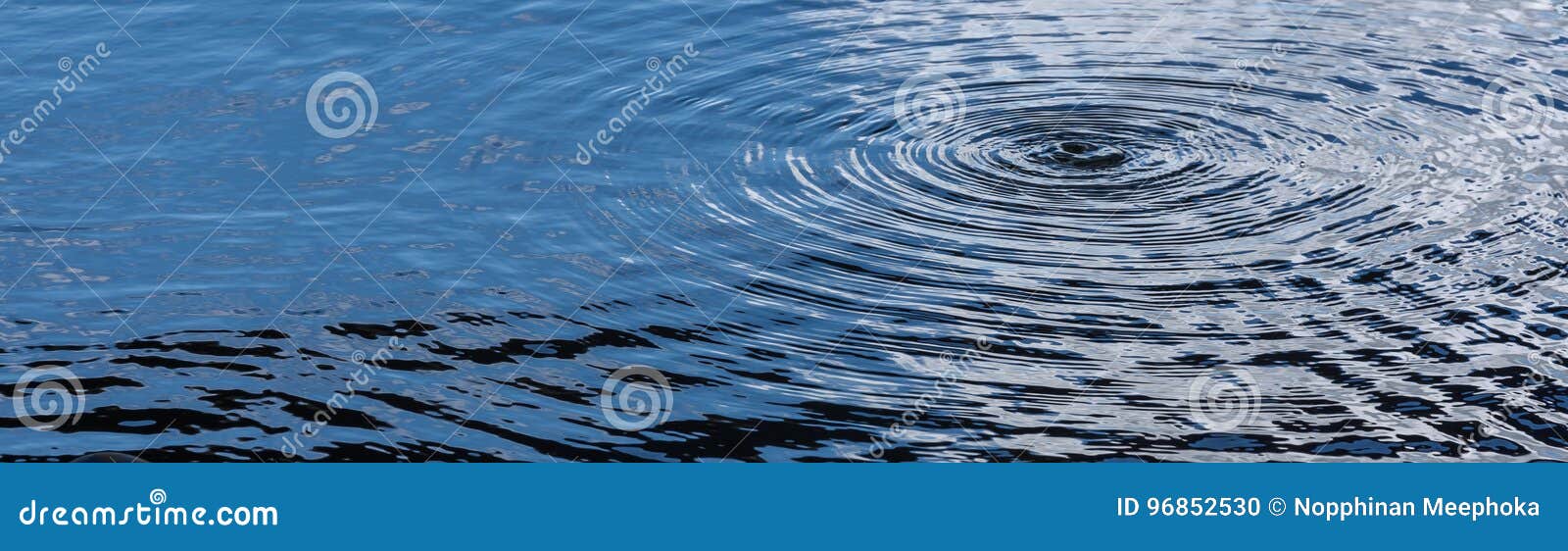 Water Surface and Water Drop with Waves of Water in Sun Light and Sky ...