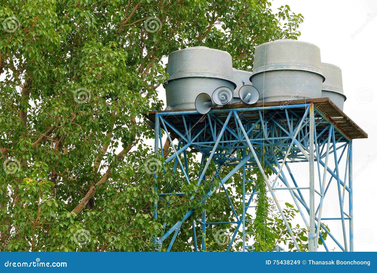 Water tank tower stock image. Image of blue, village - 75438249