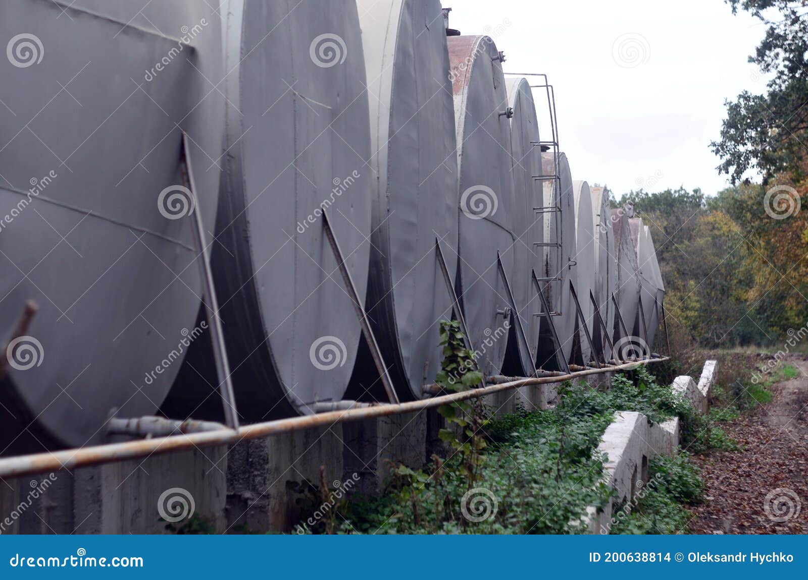 Water Tanks at the Edge of the Field Stock Photo - Image of tanks ...