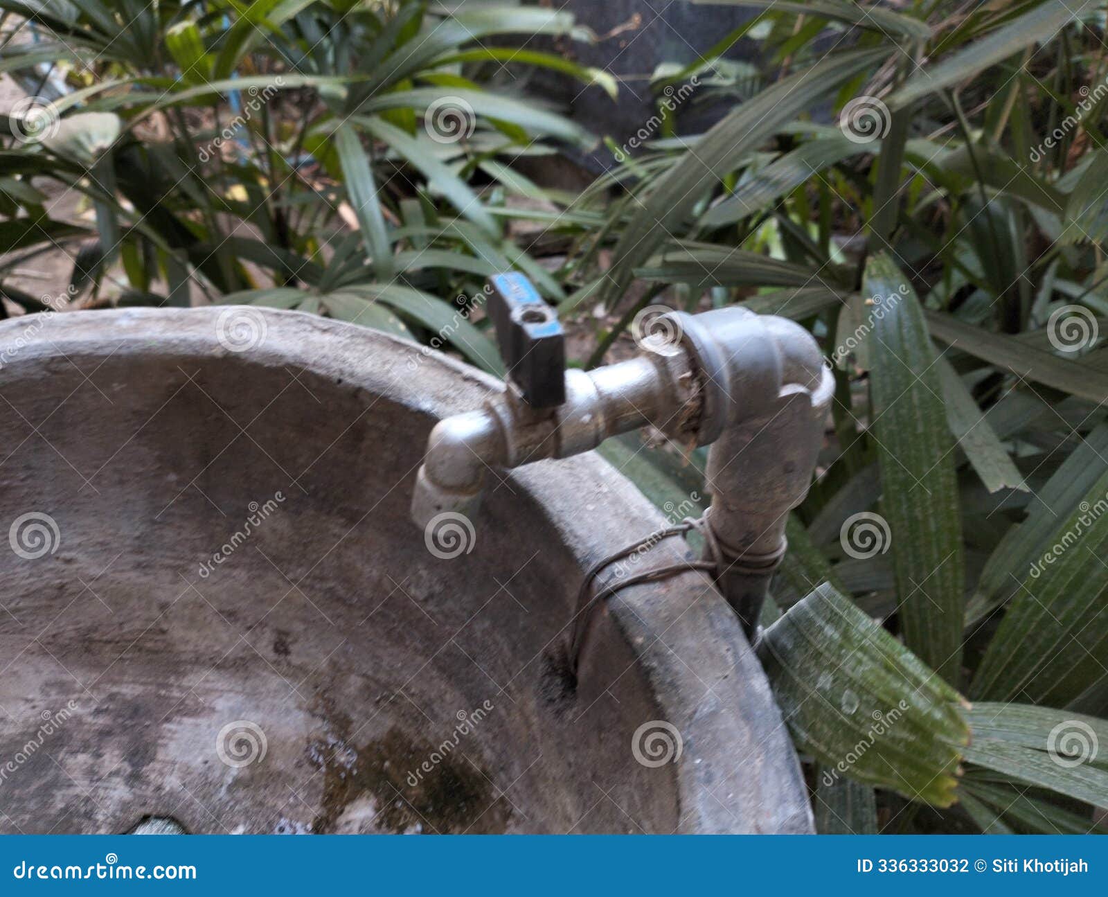 Water Tap Visible from the Side Stock Photo - Image of pipe, buildings ...