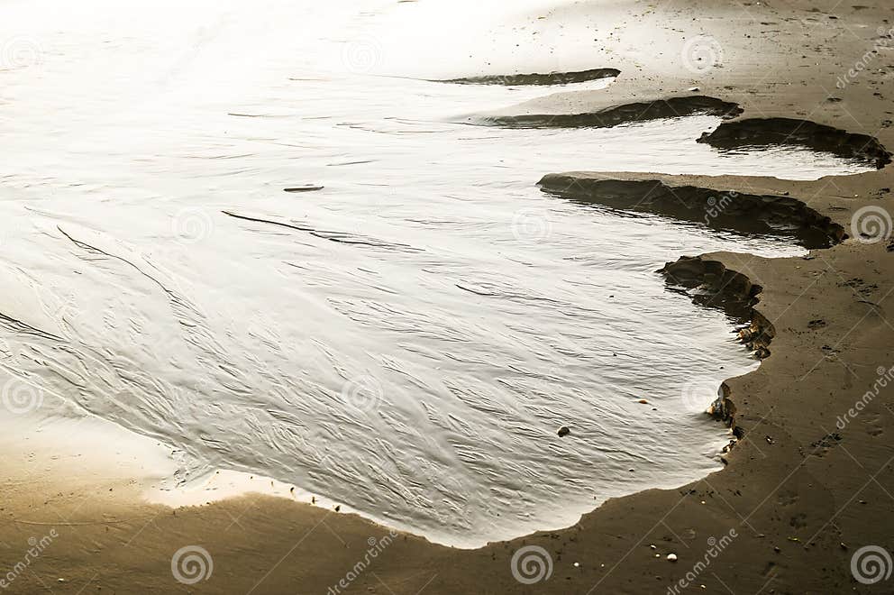 Water tide stock photo. Image of blue, beach, sunrise - 67331044