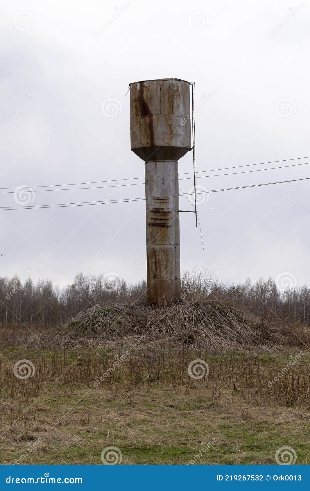 Water tower in the field stock photo. Image of utility - 219267532