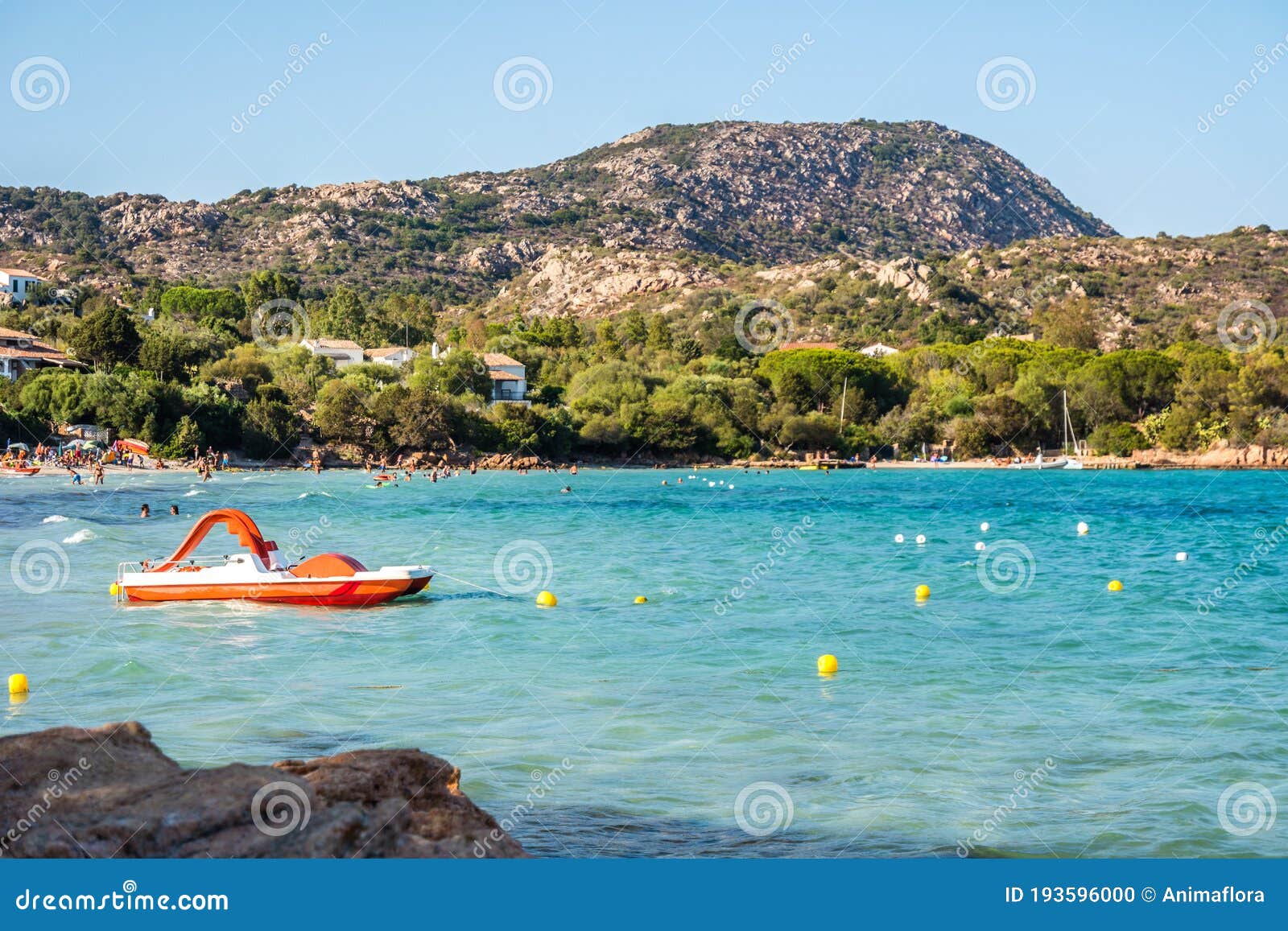 Water Treader Porto Istana Beach Stock Photo - Image of holiday, green ...