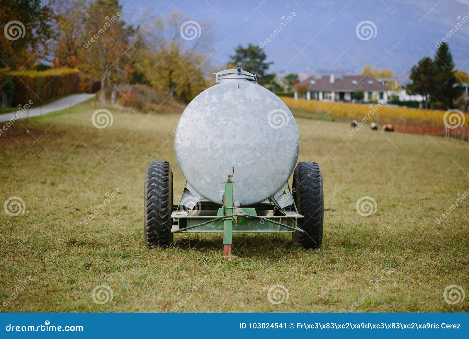 Water trough in a field stock image. Image of fenced - 103024541