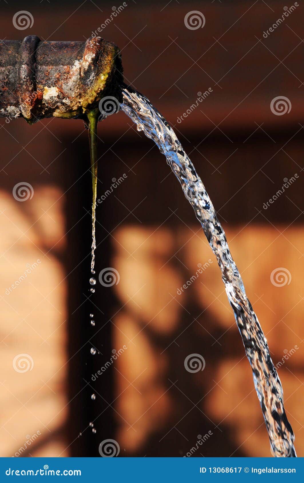 Water Trough Spout With Running Water Royalty-Free Stock Photography ...