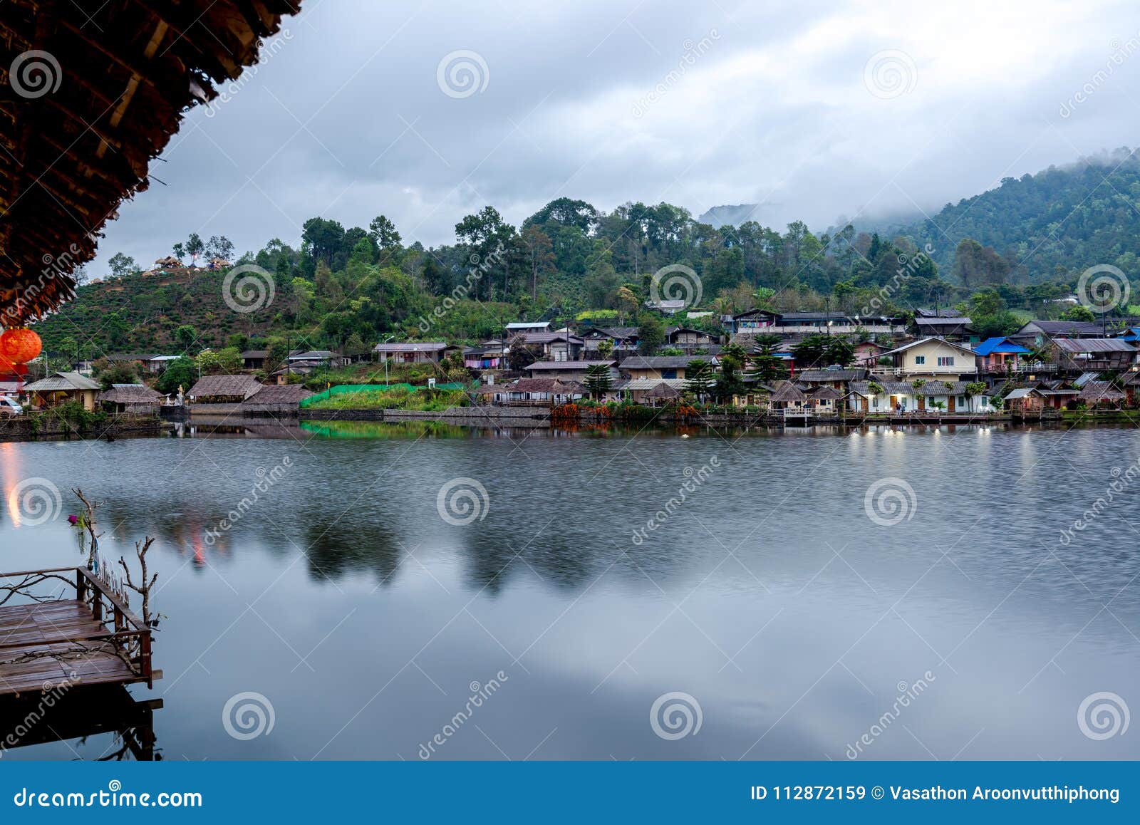 Water Village at the Edge of River in Front of the Mountain Stock Image ... Water Village at the Edge of River in Front of the Mountain Stock Image ...