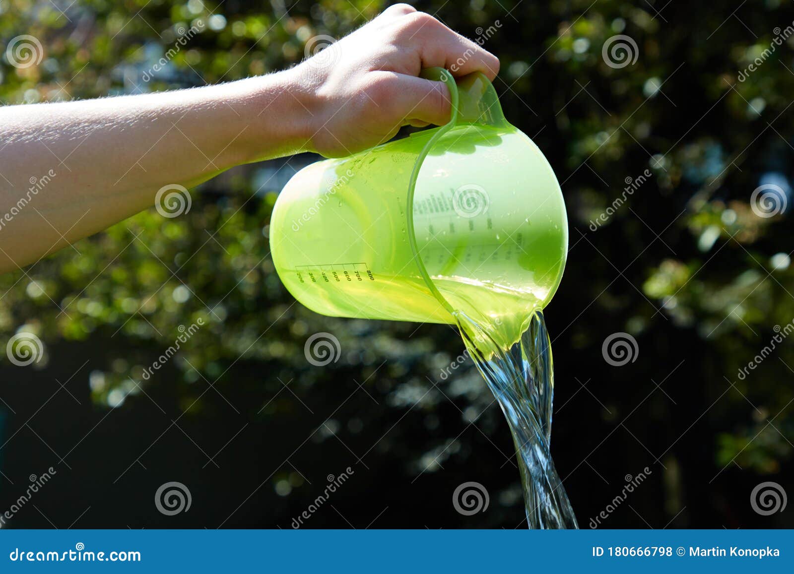 Water stock photo. Image of irrigate, flow, liter, hand - 180666798
