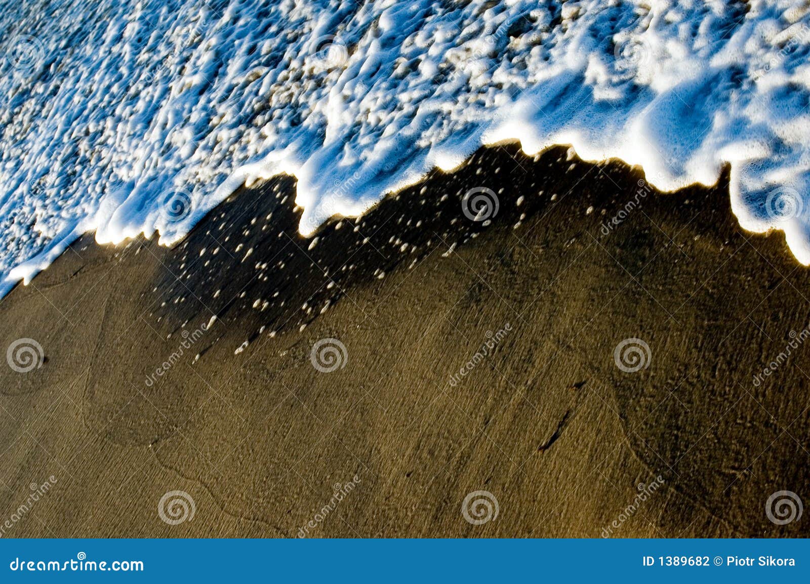 Water Wave Spume on the Beach Stock Photo - Image of nature, foam: 1389682