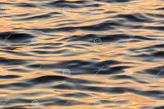 The Water Waves Effect at Sunset Time Stock Photo - Image of ...