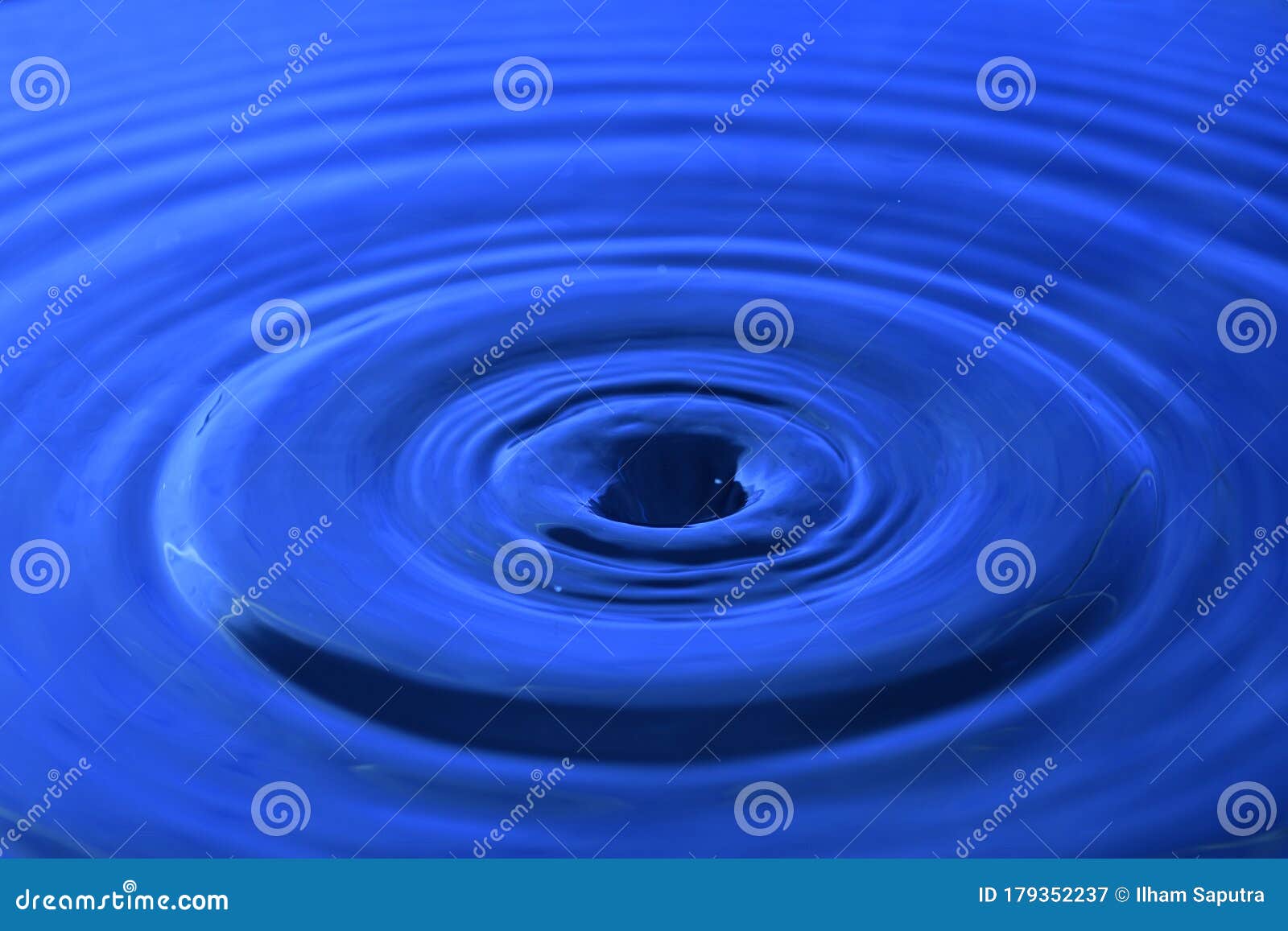 Water Waves Splash in a Glass Blue Colored Stock Image - Image of blue ...