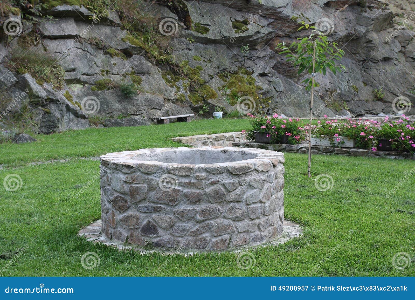 Water well in garden stock image. Image of grass, cistern - 49200957