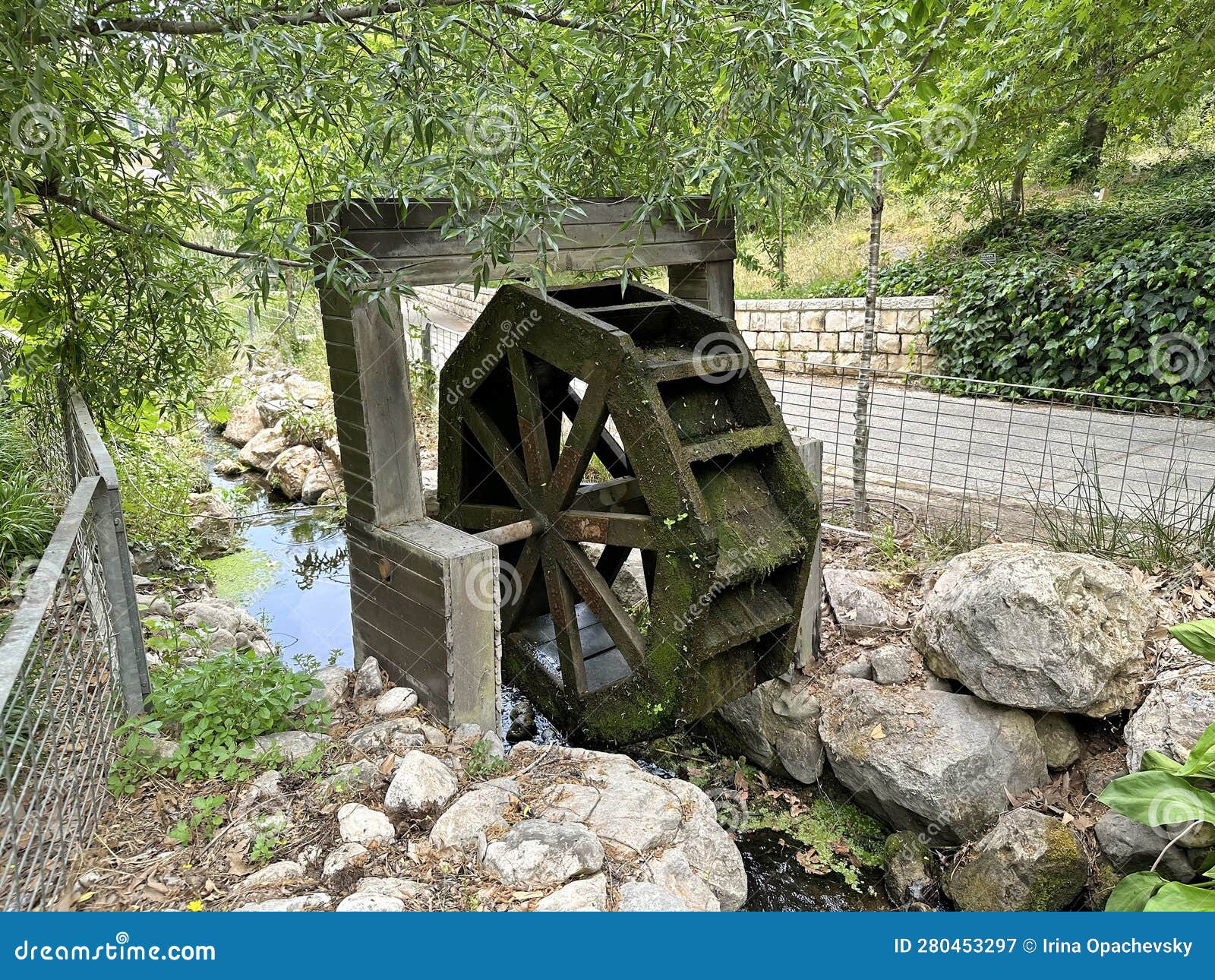 Water Wheel on a Stream in a Botanical Garden Stock Image - Image of ...