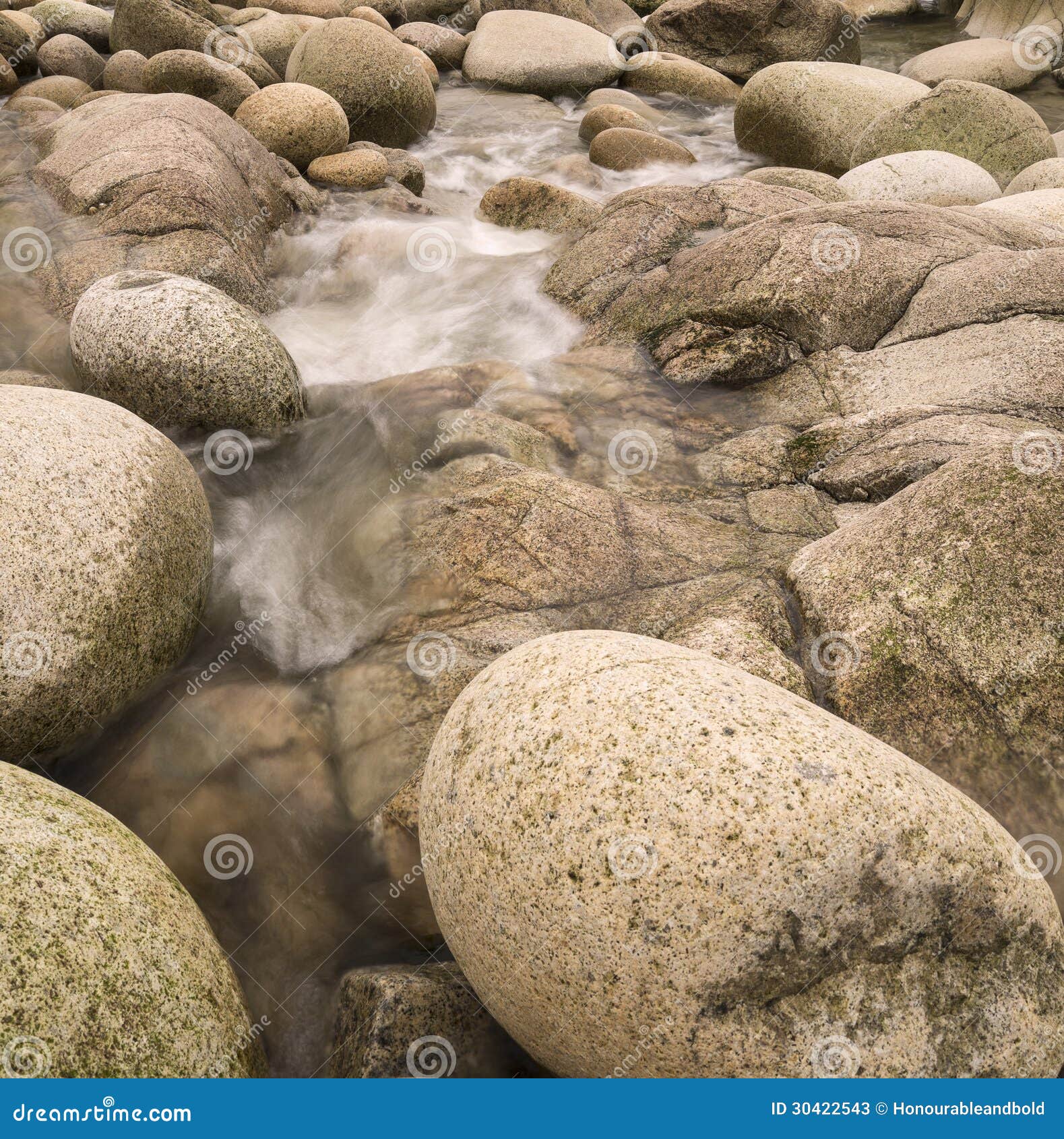 Water Worn Ancient Rocks Detail on Secluded Beach Stock Image - Image ...